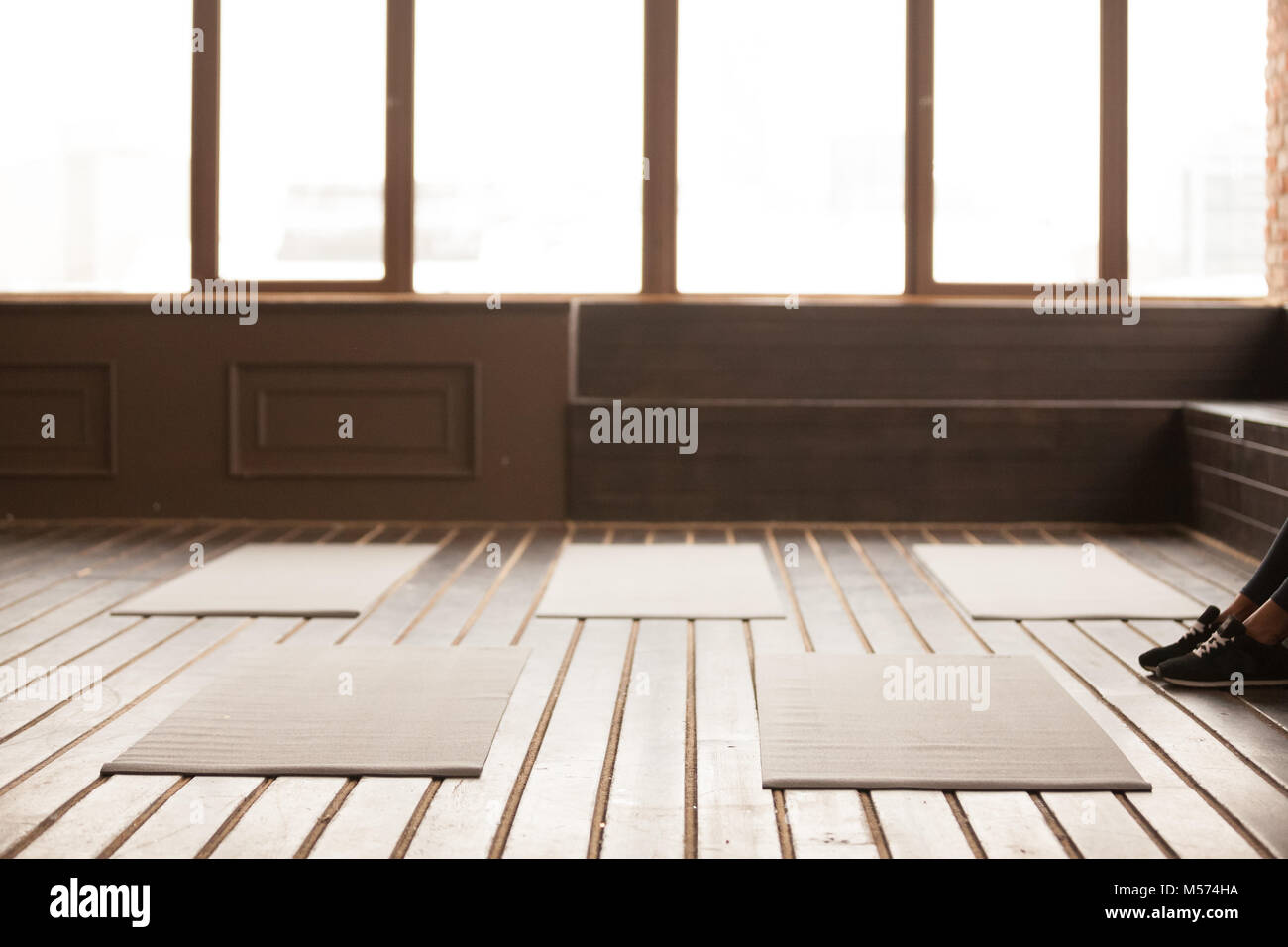 Empty yoga studio mats hi-res stock photography and images - Alamy