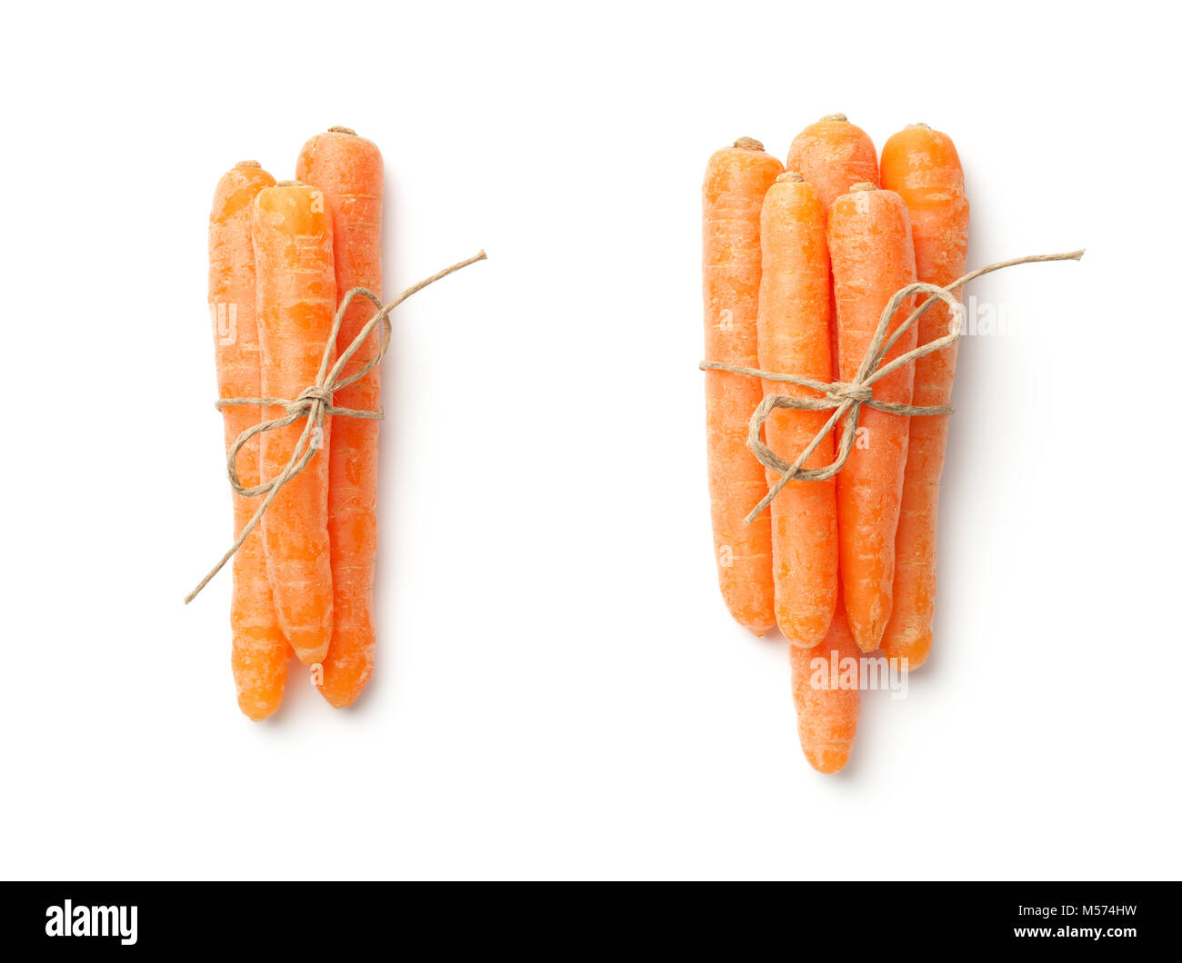 Baby, mini carrots isolated on white background. To view Stock Photo ...