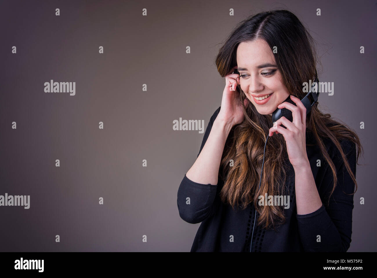Songs favorite young woman hi-res stock photography and images - Alamy