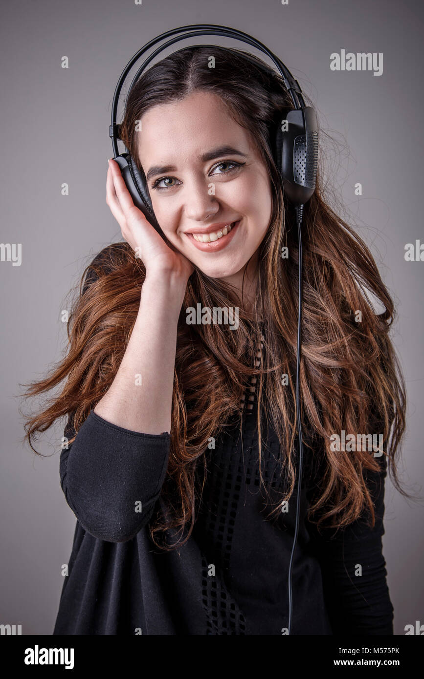 Songs favorite young woman hi-res stock photography and images - Alamy