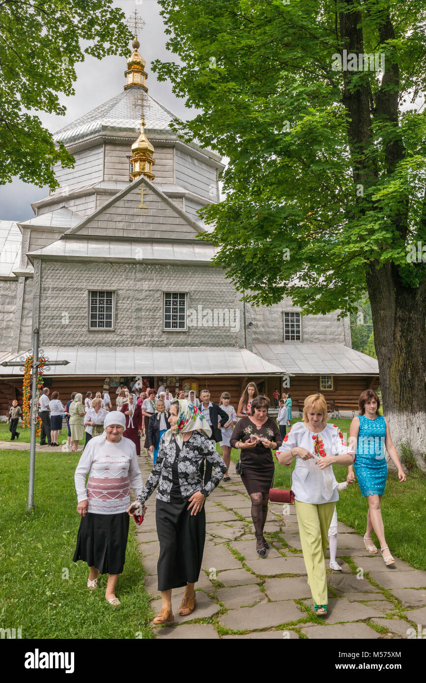 Churchgoers leaving after mass at Holy Trinity Greek Catholic Church ...