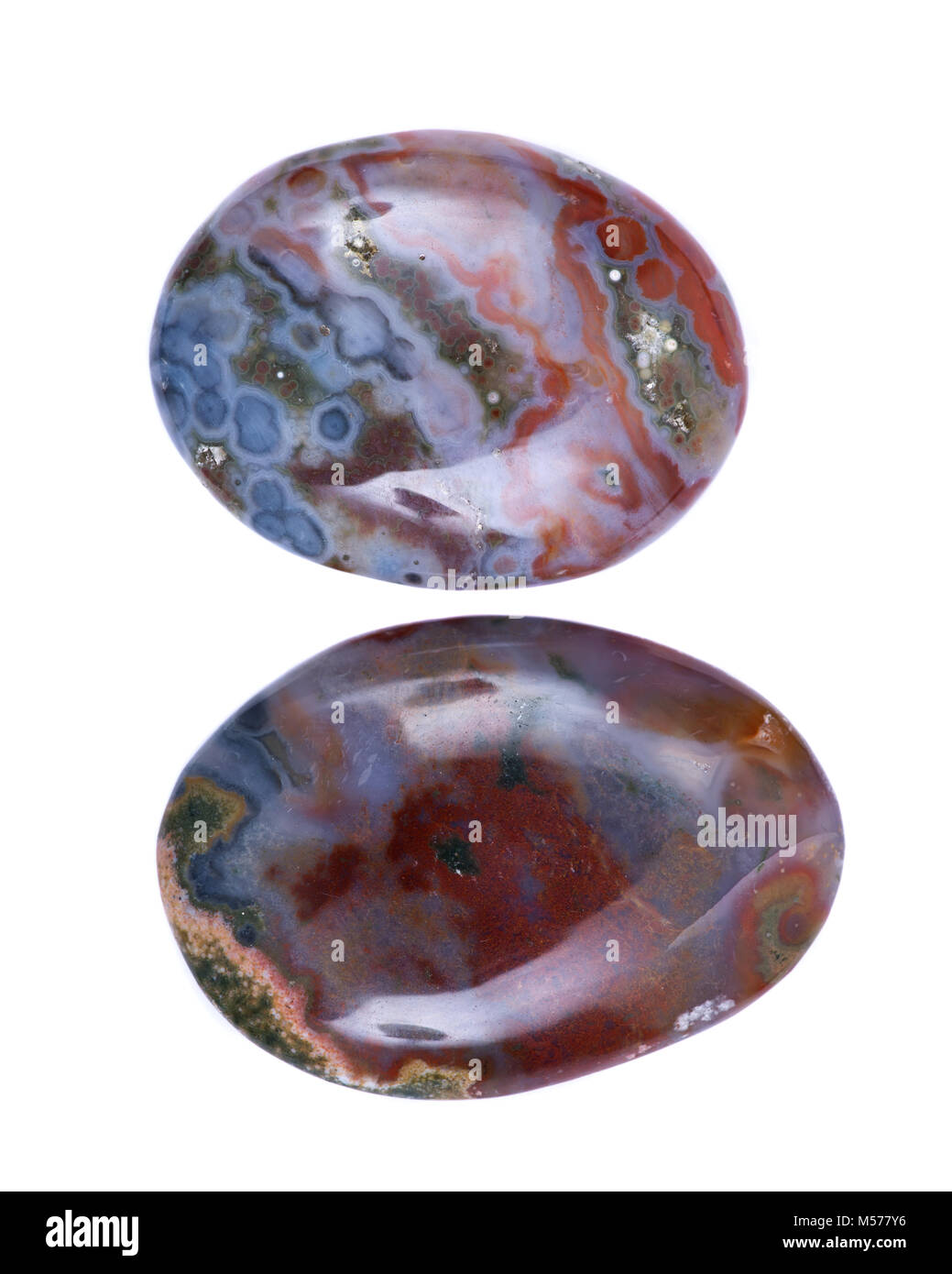 Polished ocean jasper palm stone from Madagascar isolated on white ...