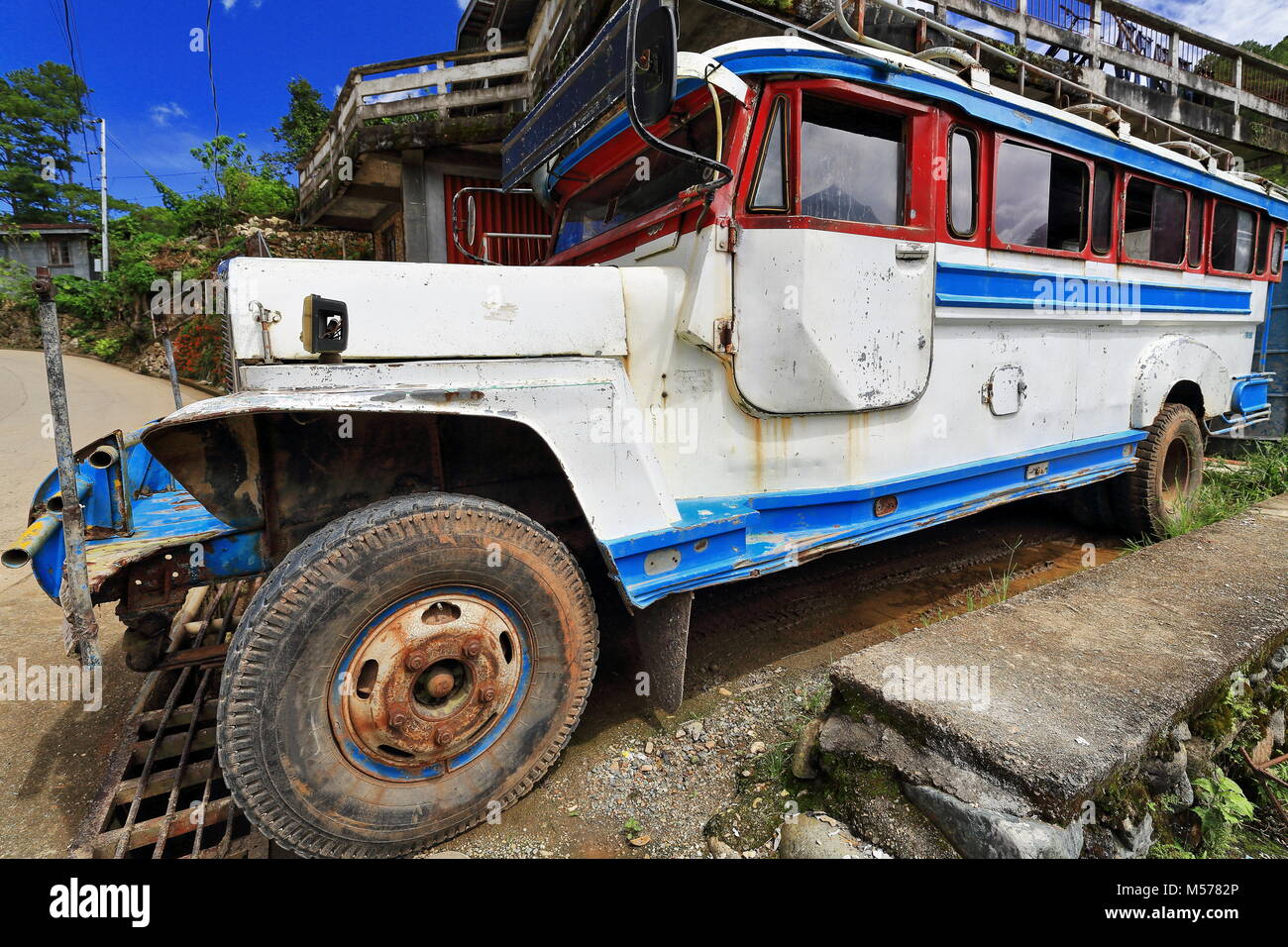 Filipino white-blue dyipni-jeepney car. Public transportation in Sagada ...