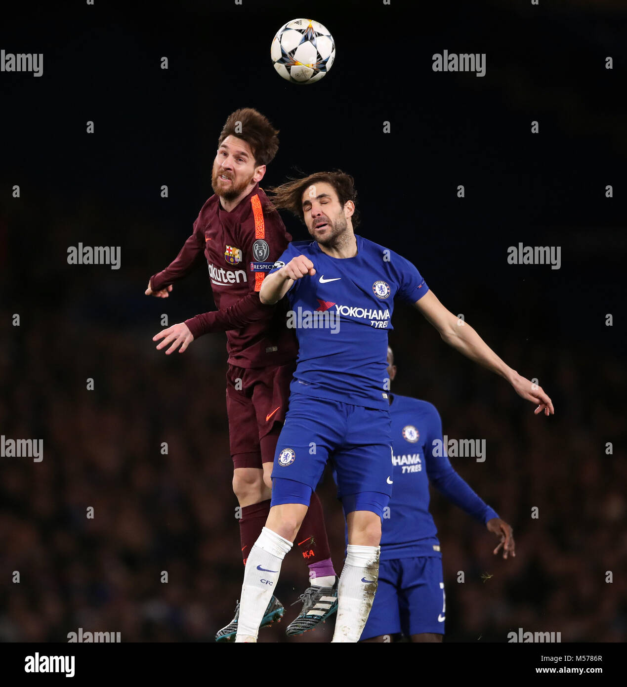 Chelsea's Cesc Fabregas (right) and Barcelona's Lionel Messi battle for ...