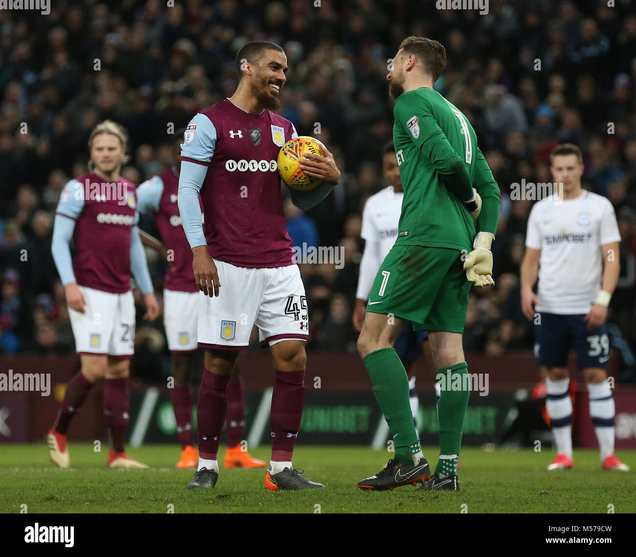Preston North End goalkeeper Declan Rudd tries to put Aston Villa's ...