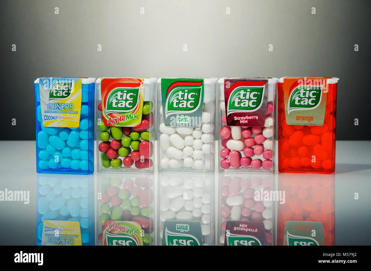 Tic tac drops isolated on gradient background Stock Photo - Alamy