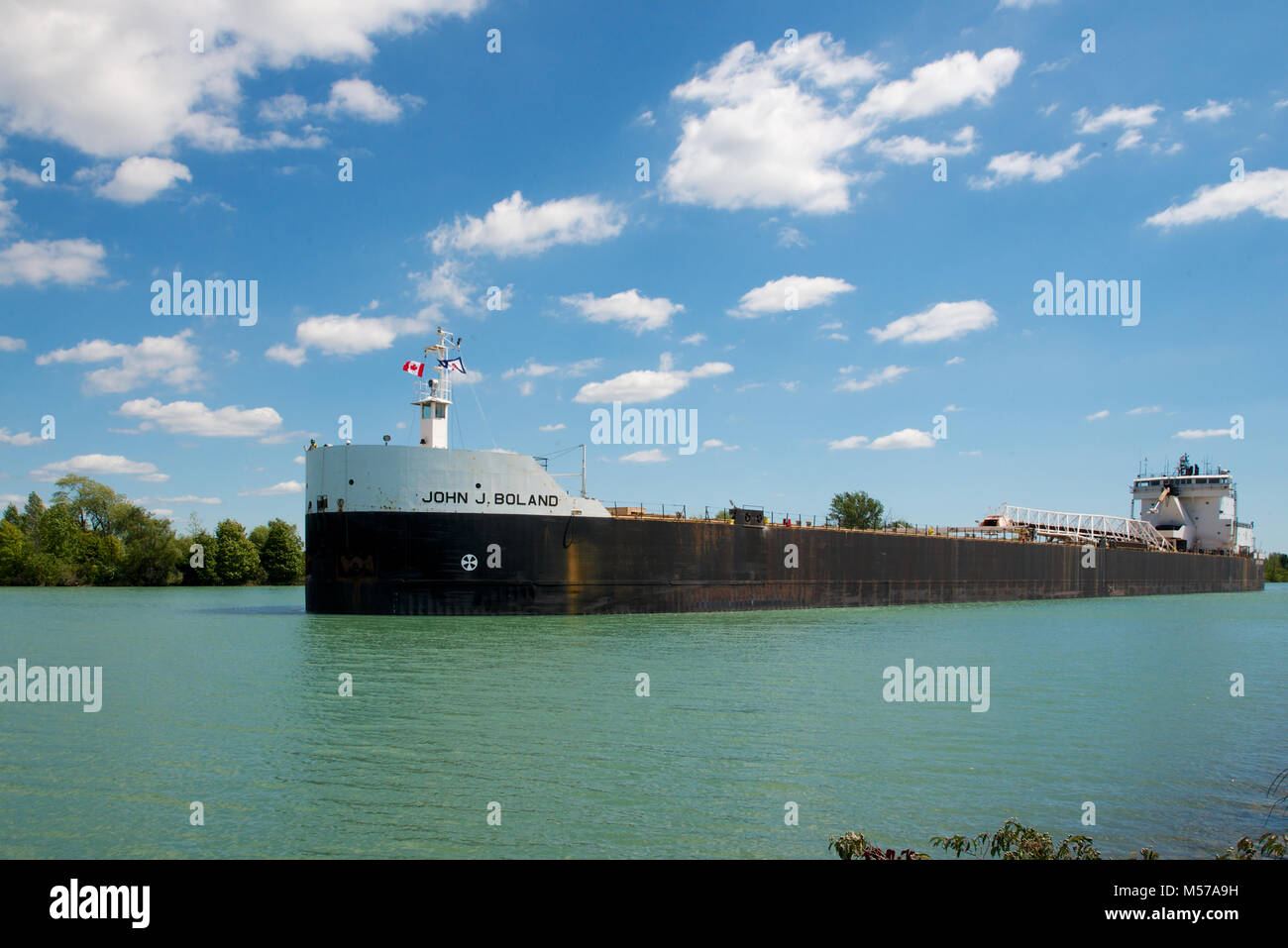 The John J. Boland self-unloading bulk carrier passing through the ...