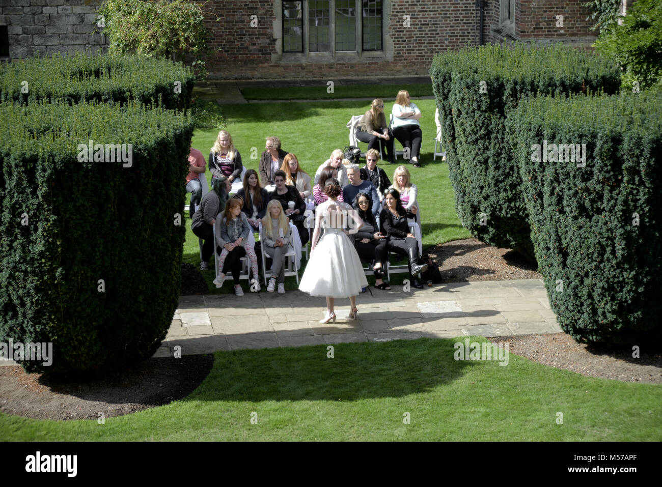 Beautiful Models wearing Bridal wear are walking on a catwalk at ...