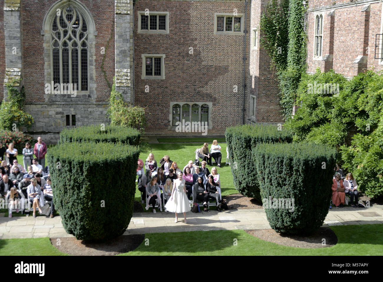 Beautiful Models wearing Bridal wear are walking on a catwalk at ...