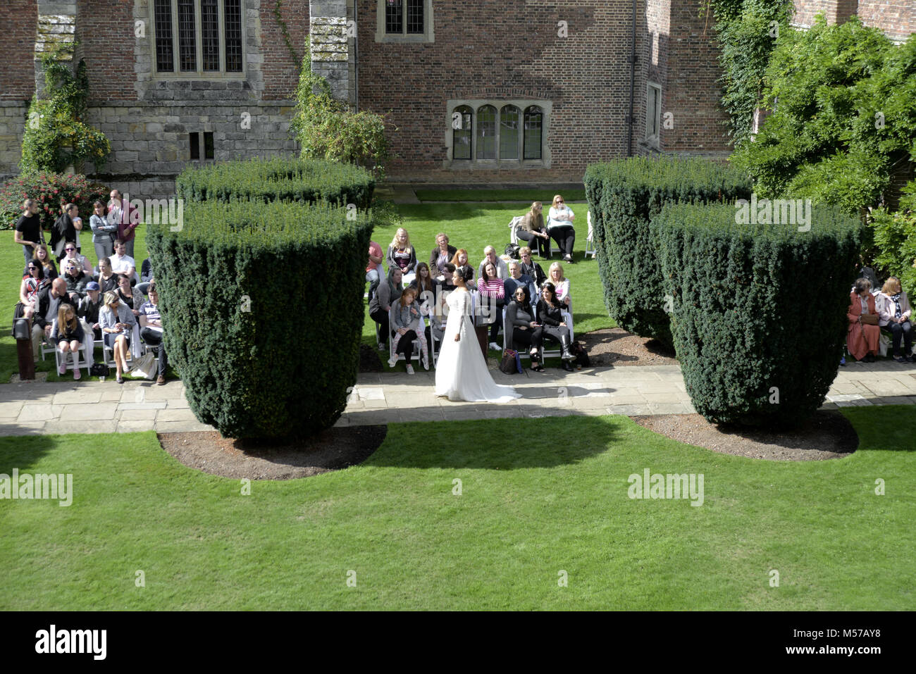 Beautiful Models wearing Bridal wear are walking on a catwalk at ...