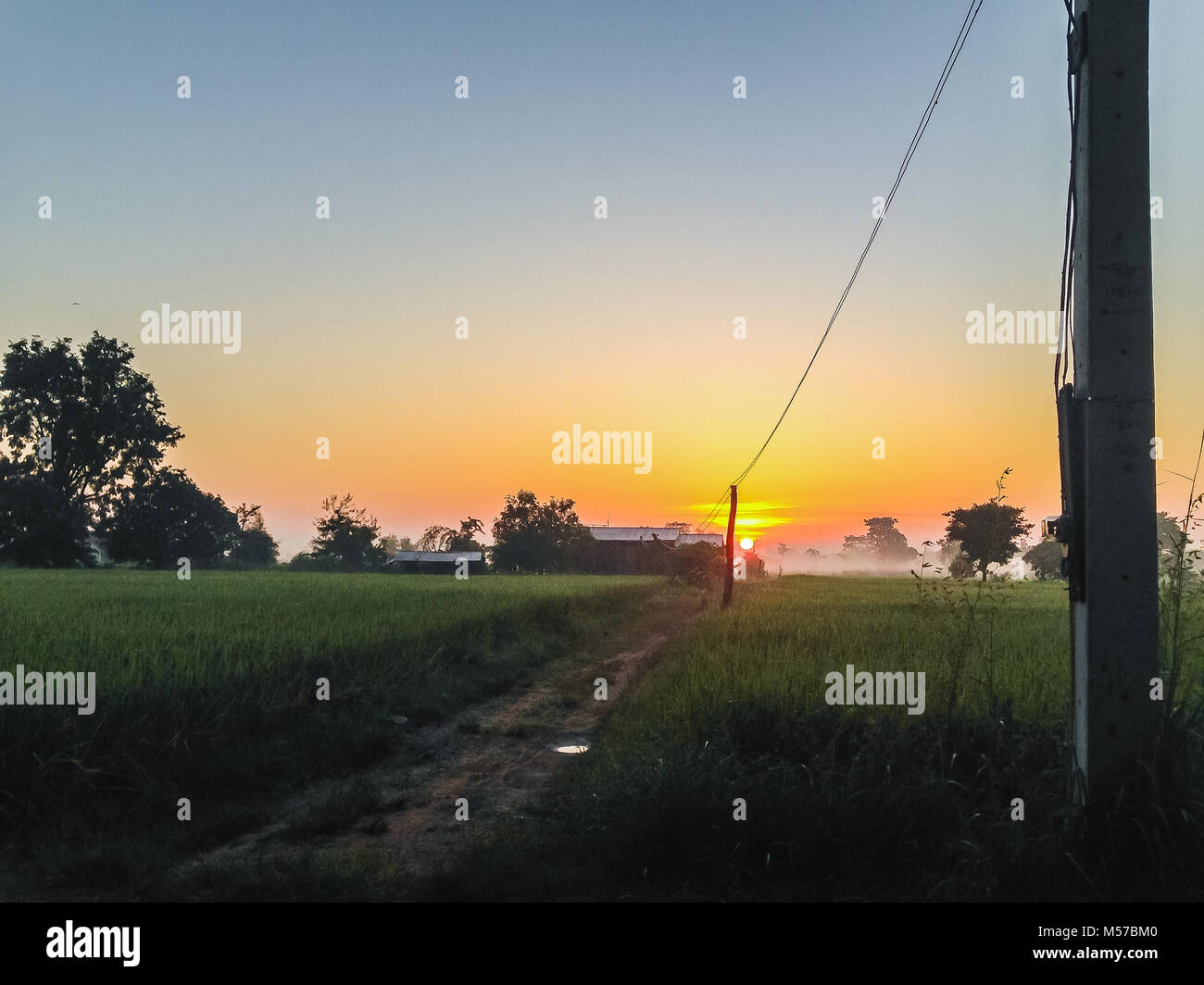 The Rural Area in the Morning with sunrise background and foreground ...