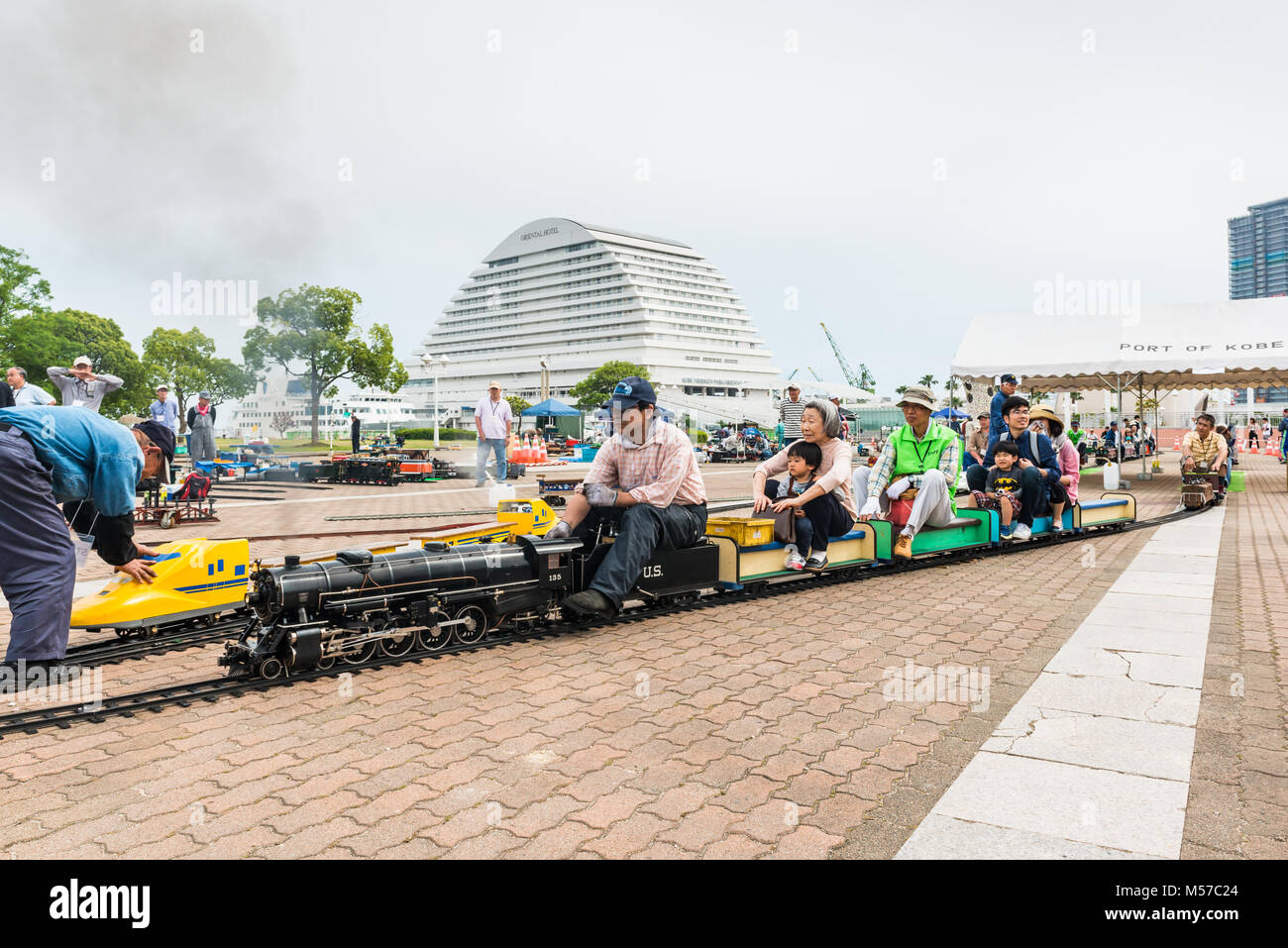 Ride on model trains, Meriken Park, Kobe, Japan Stock Photo - Alamy
