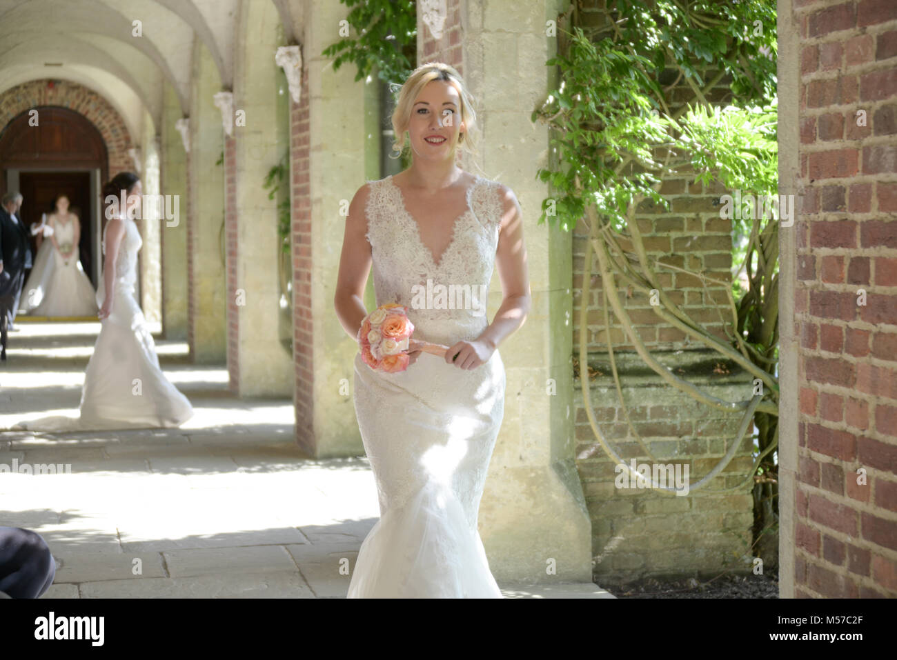 Beautiful Models wearing Bridal wear are walking on a catwalk at ...