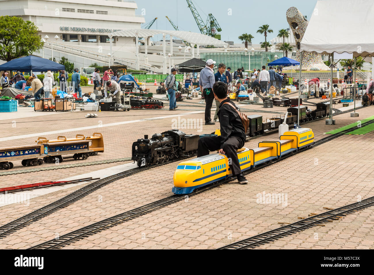 Ride on model trains, Meriken Park, Kobe, Japan Stock Photo - Alamy