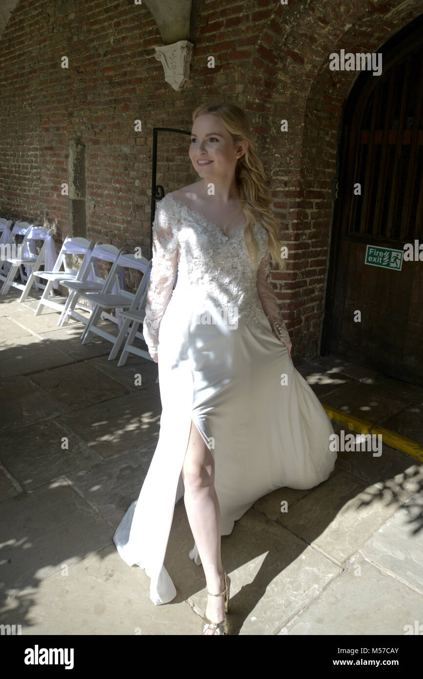 Beautiful Models wearing Bridal wear are walking on a catwalk at ...