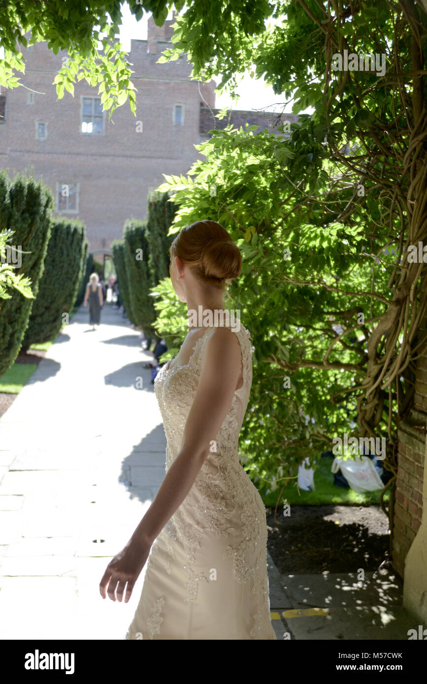 Beautiful Models wearing Bridal wear are walking on a catwalk at ...