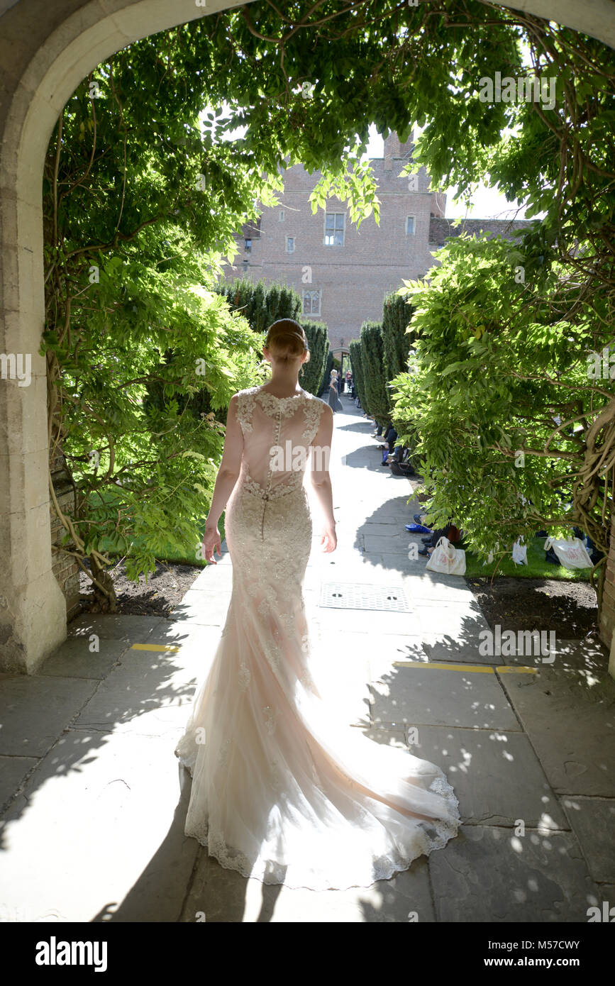Beautiful Models wearing Bridal wear are walking on a catwalk at ...