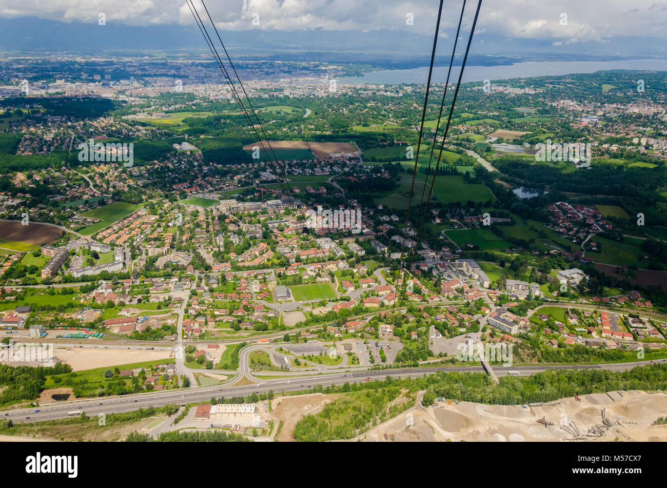 View from the descending Mont Salève cable car towards the base station ...