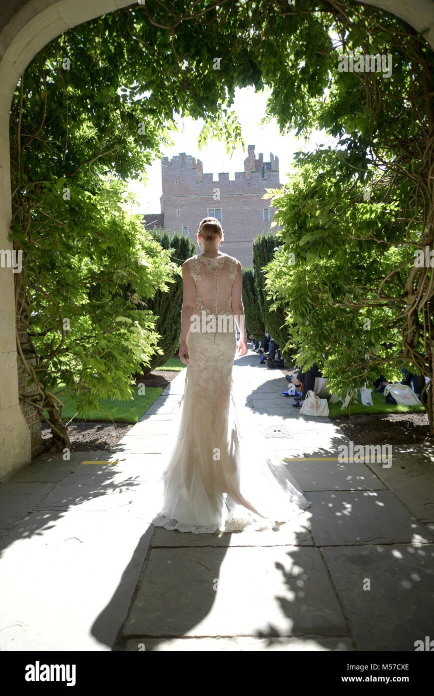 Beautiful Models wearing Bridal wear are walking on a catwalk at ...