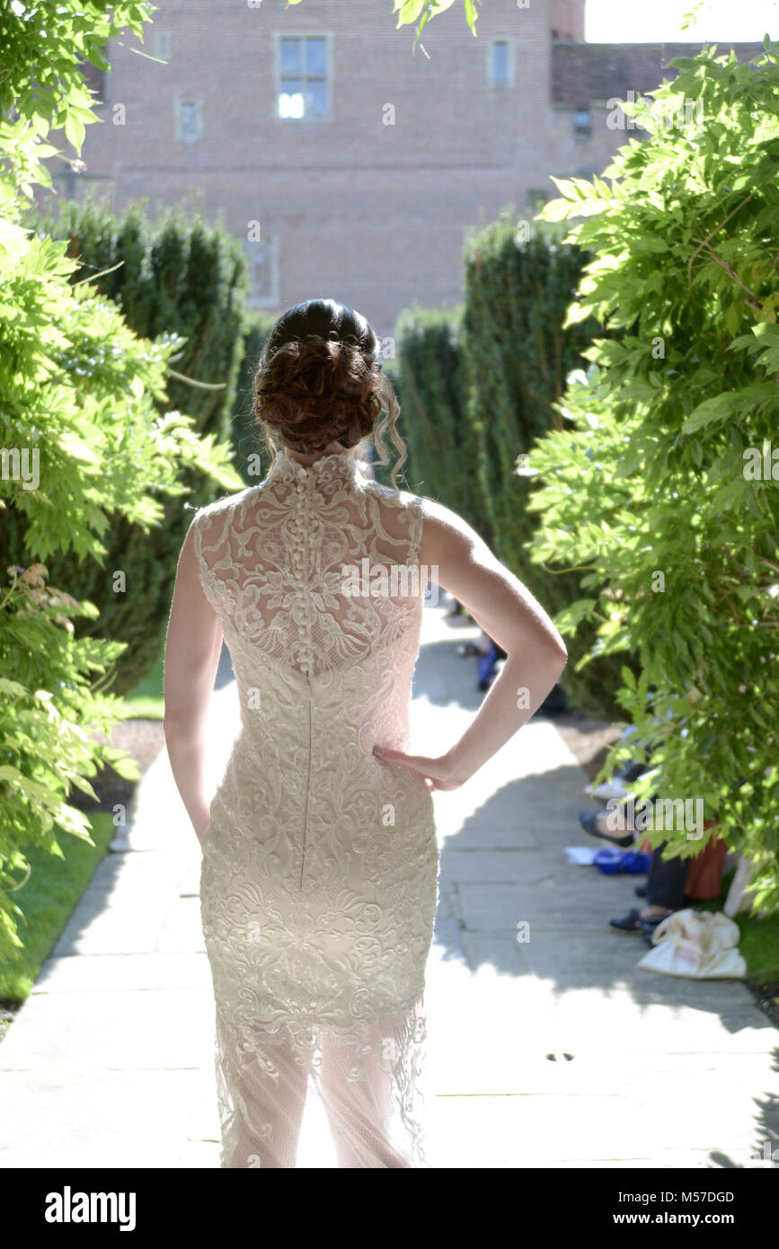 Beautiful Models wearing Bridal wear are walking on a catwalk at ...