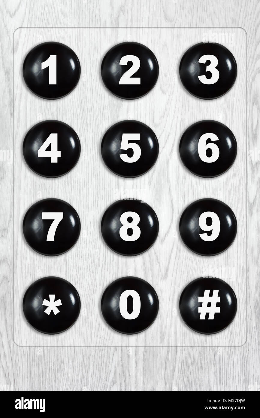 Telephone keyboard on white wood texture Stock Photo - Alamy