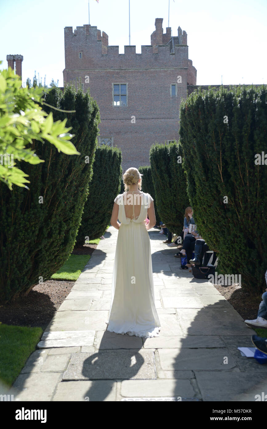 Beautiful Models wearing Bridal wear are walking on a catwalk at ...