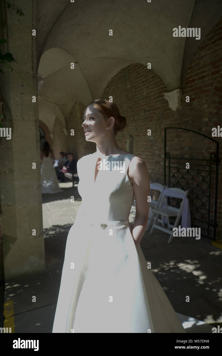 Beautiful Models wearing Bridal wear are walking on a catwalk at ...
