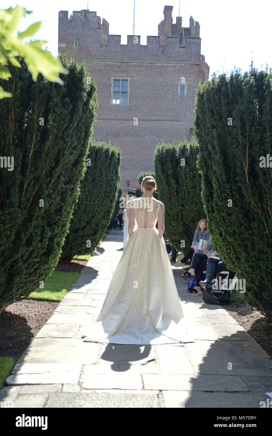 Beautiful Models wearing Bridal wear are walking on a catwalk at ...