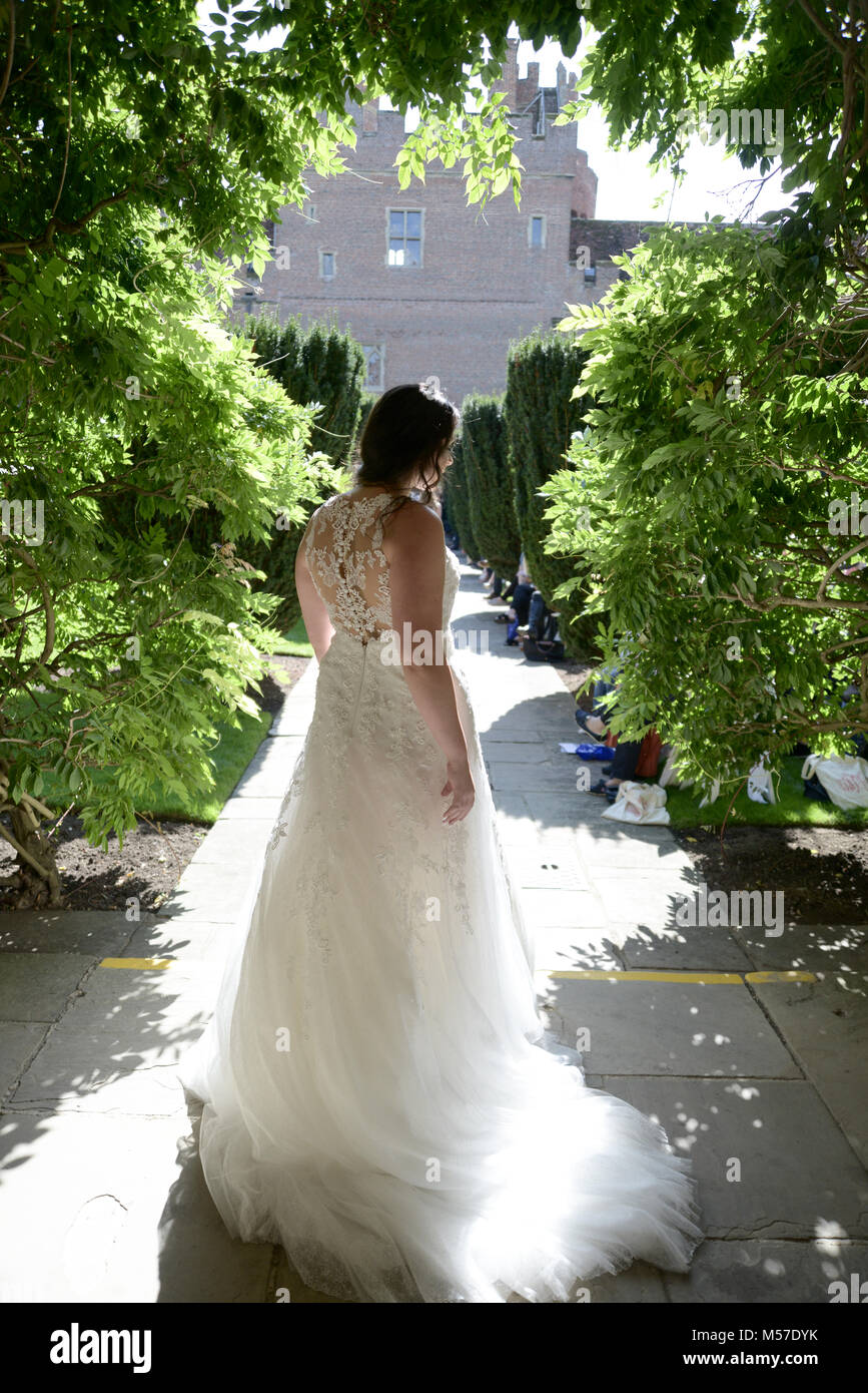 Beautiful Models wearing Bridal wear are walking on a catwalk at ...