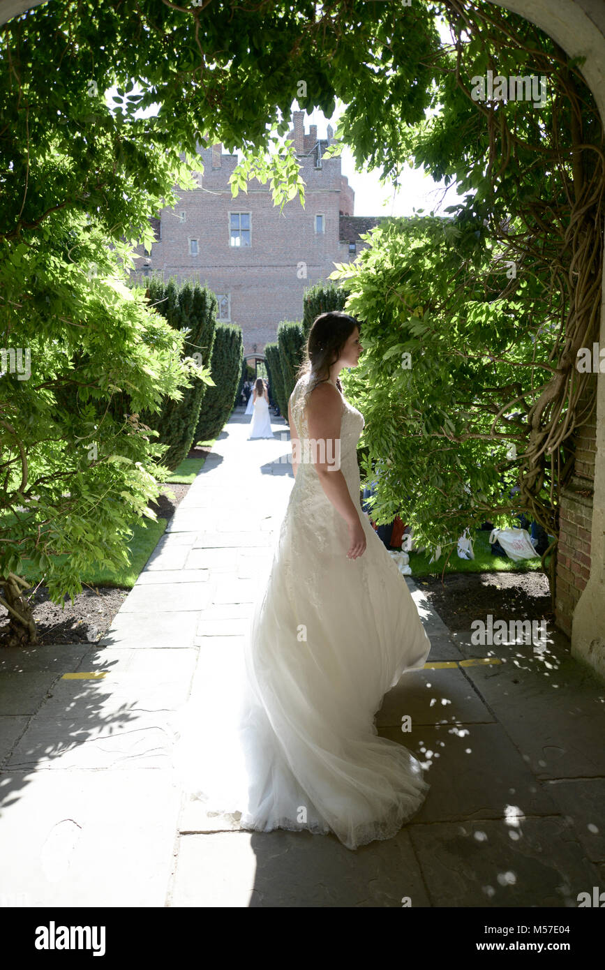 Beautiful Models wearing Bridal wear are walking on a catwalk at ...