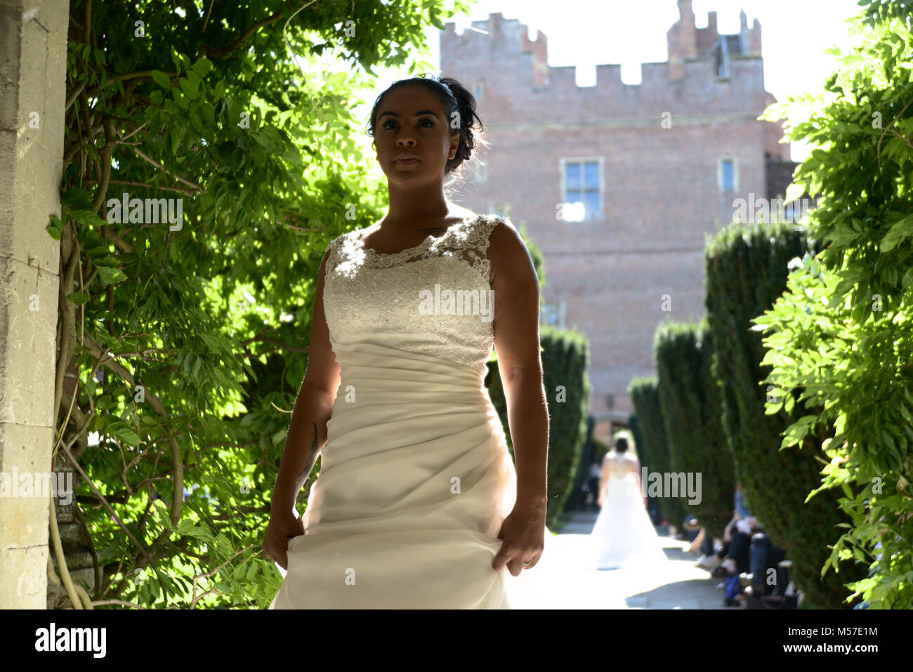 Beautiful Models wearing Bridal wear are walking on a catwalk at ...