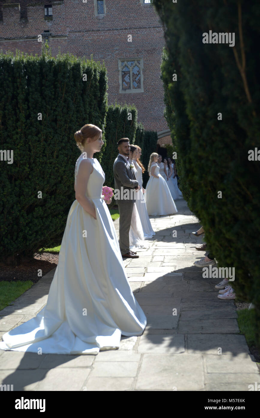 Beautiful Models wearing Bridal wear are walking on a catwalk at ...