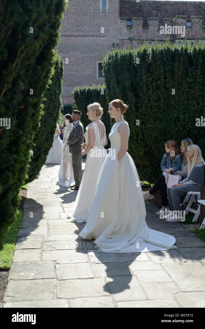 Beautiful Models wearing Bridal wear are walking on a catwalk at ...