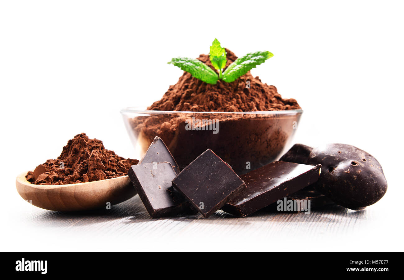 Composition with bowl of cocoa powder isolated on white Stock Photo - Alamy