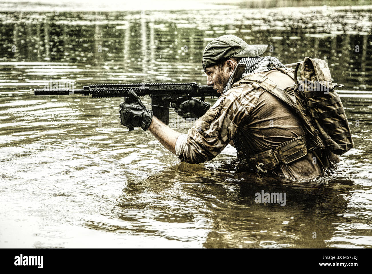 Muscular man gun hi-res stock photography and images - Alamy