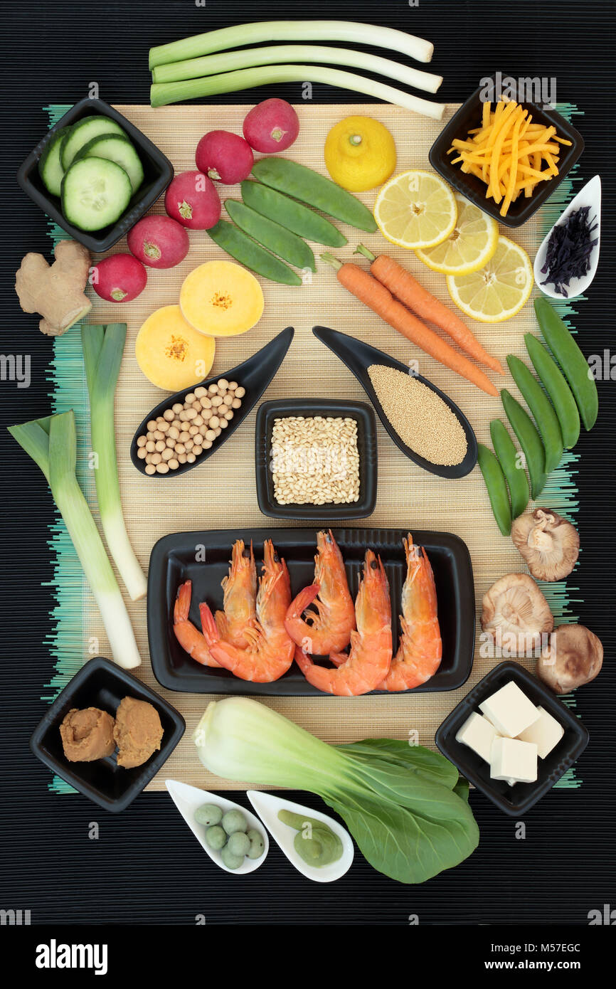 Macrobiotic diet food with seafood, wasabi paste and nuts, tofu, miso ...