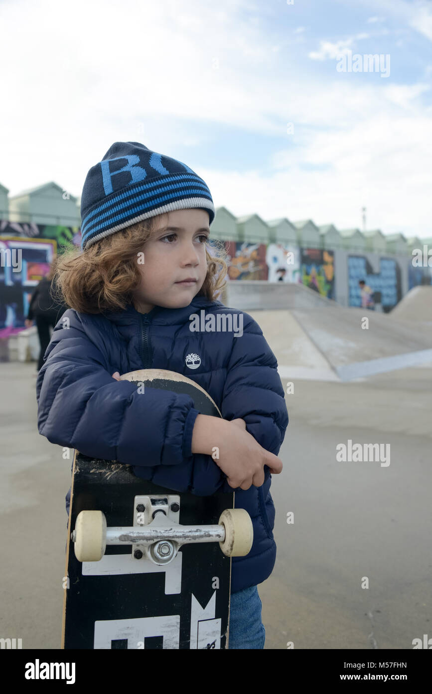 young kids are having fun at a skatepark Stock Photo - Alamy