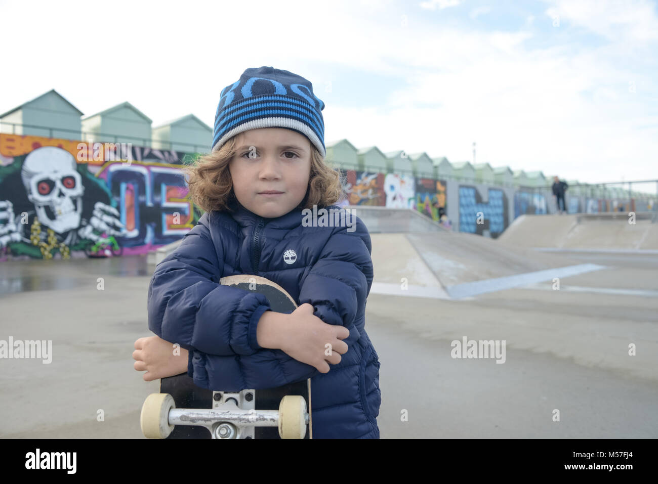 young kids are having fun at a skatepark Stock Photo - Alamy