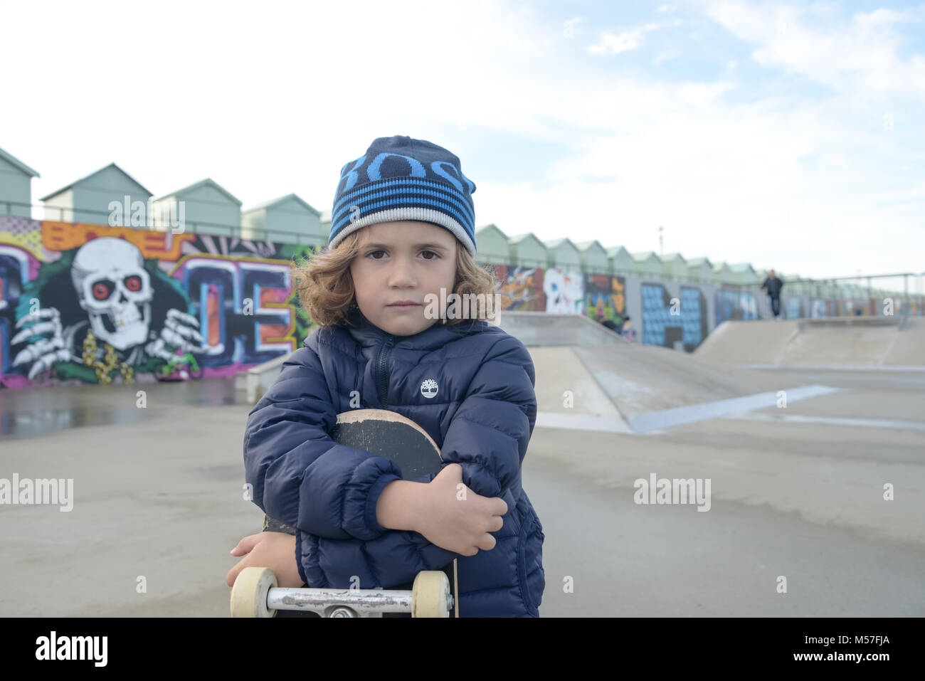 young kids are having fun at a skatepark Stock Photo - Alamy