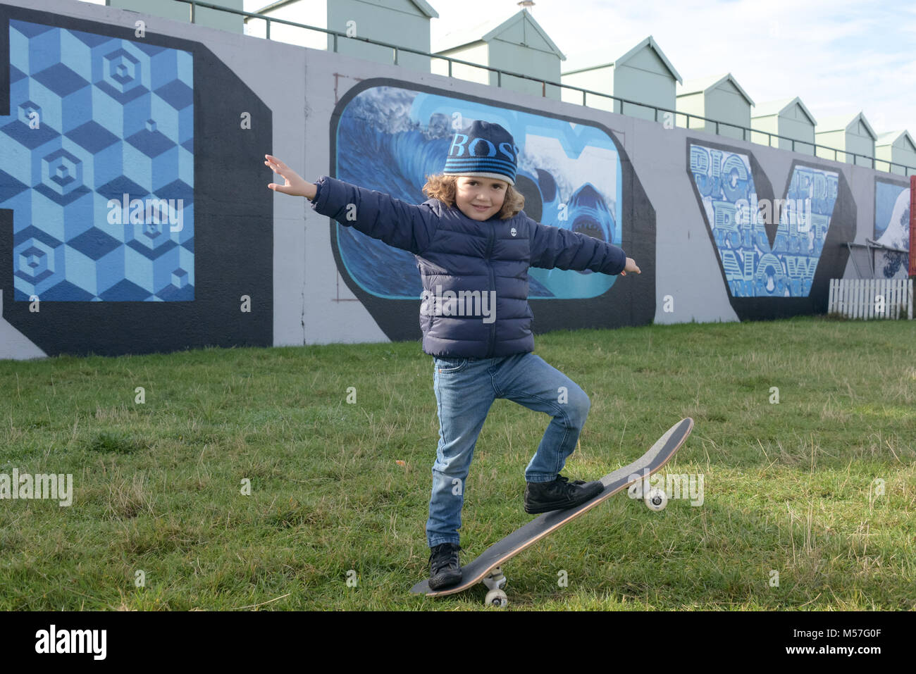 young kids are having fun at a skatepark Stock Photo - Alamy