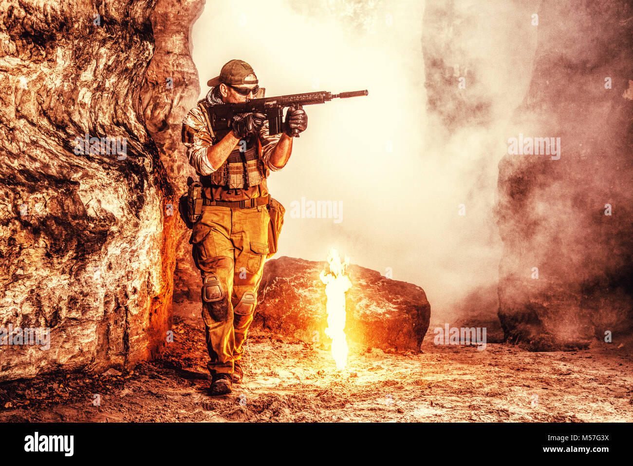 Private military contractor PMC in baseball cap with assault rifle in ...