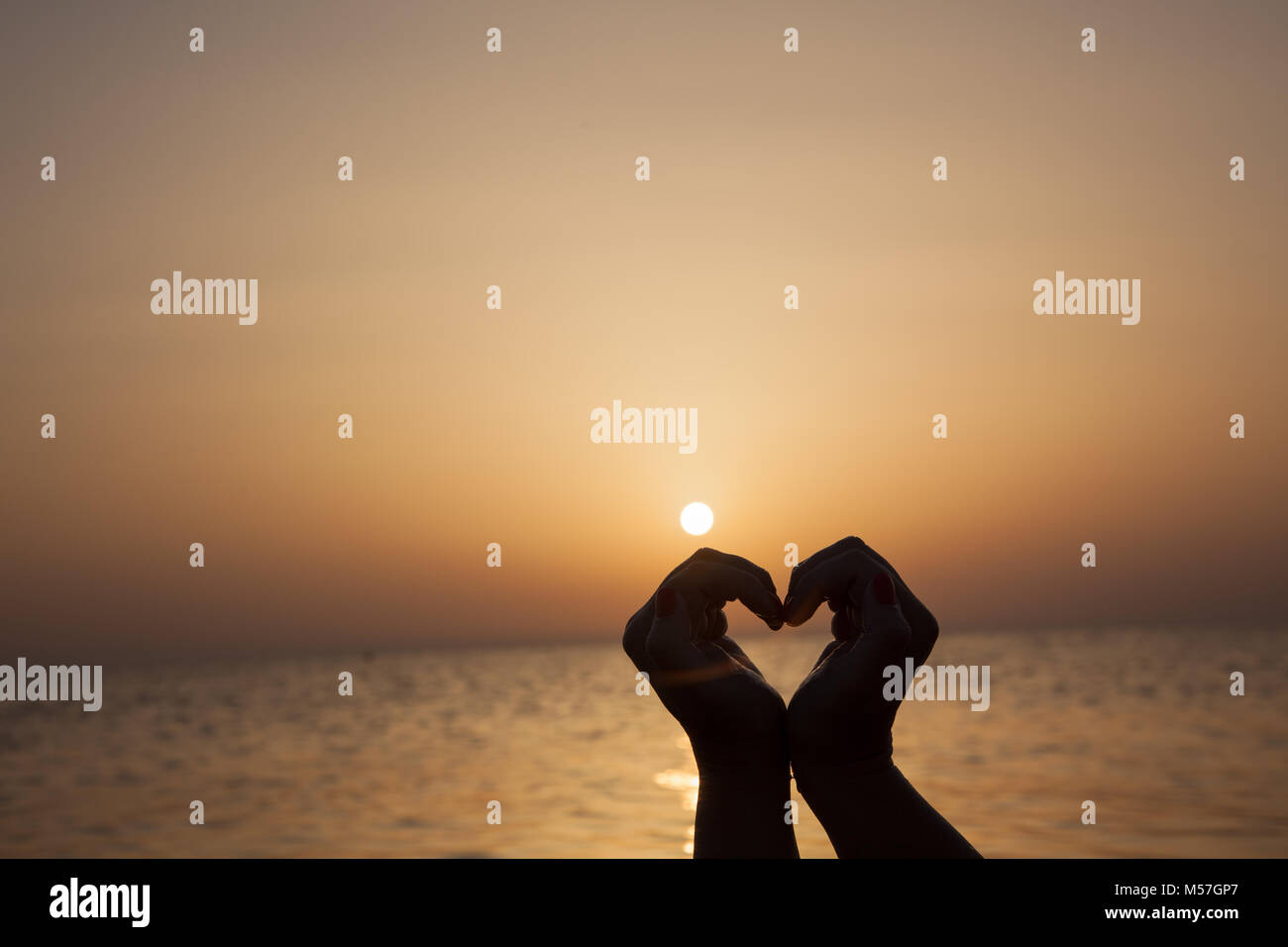 Girl in love enjoying tender moments at sunset during holiday with best ...