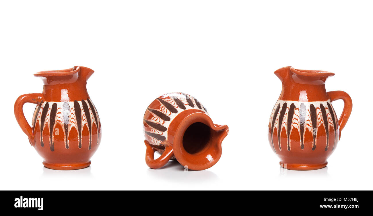 A set clay flagon with handle isolated on white background,clay pitcher ...