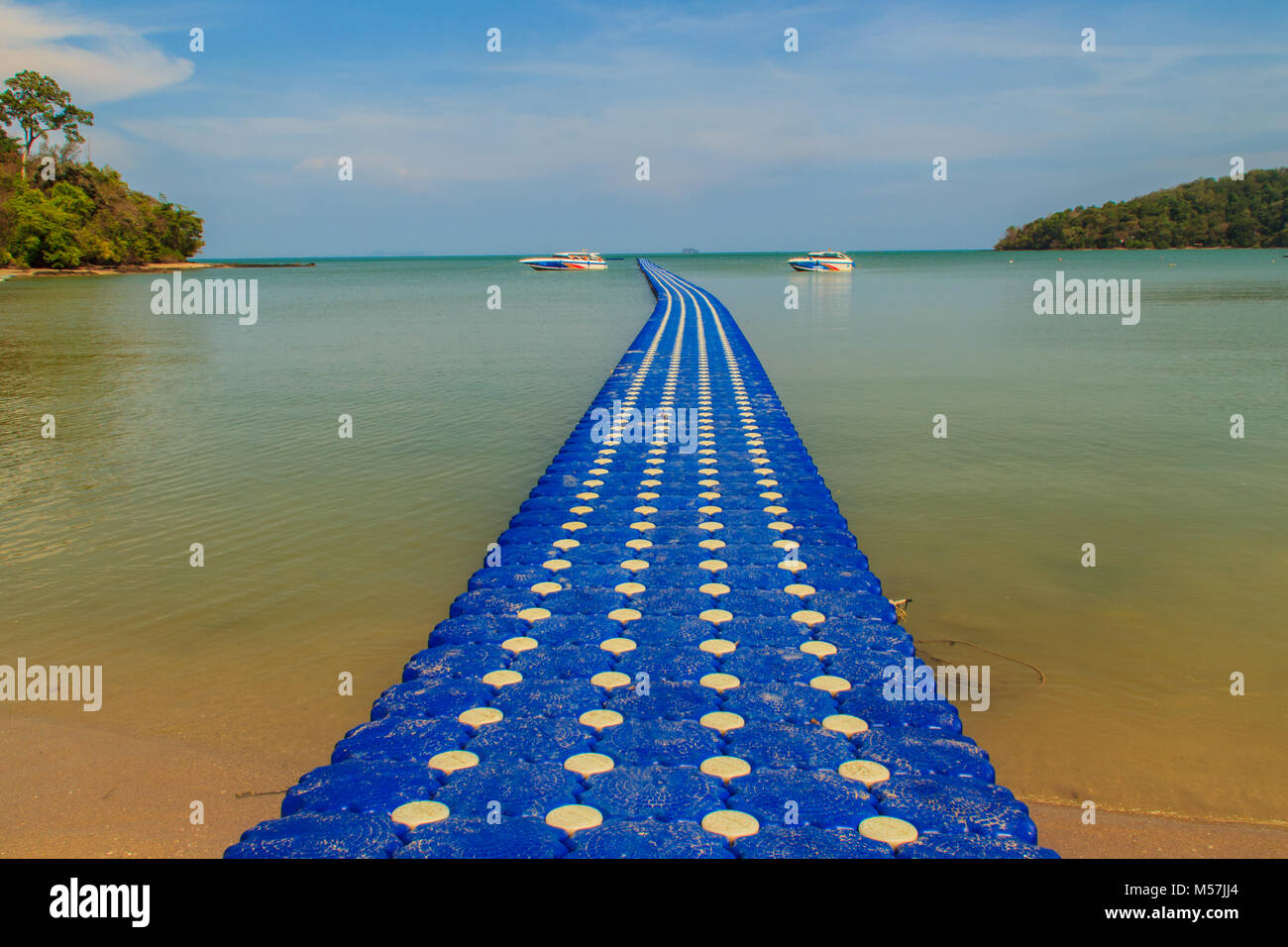 Beautiful blue pontoon made from plastic floating in the sea ...