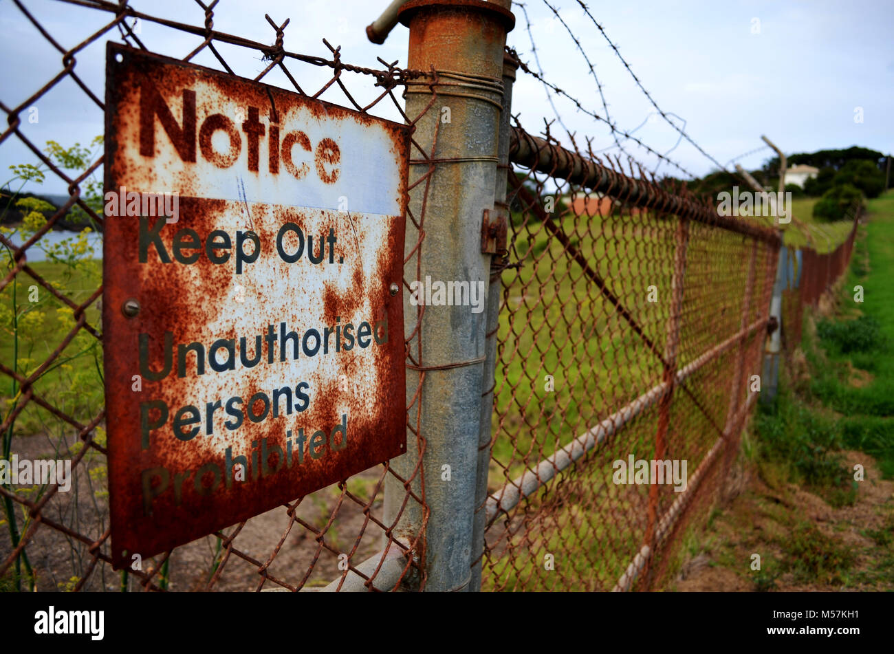 Keep Out Sign On Fence