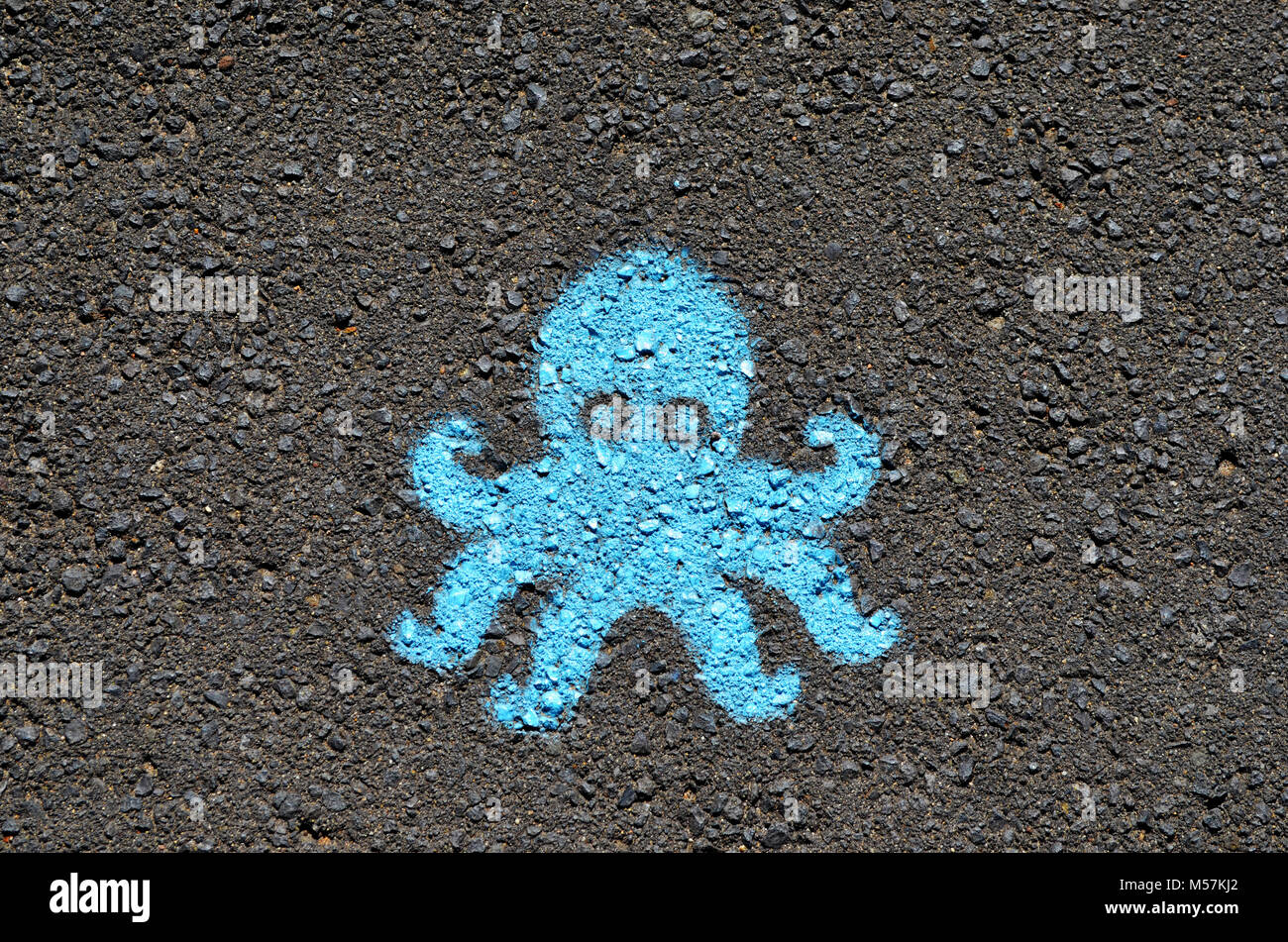 Blue Octopus painted on pavement as directional markers to follow Stock ...