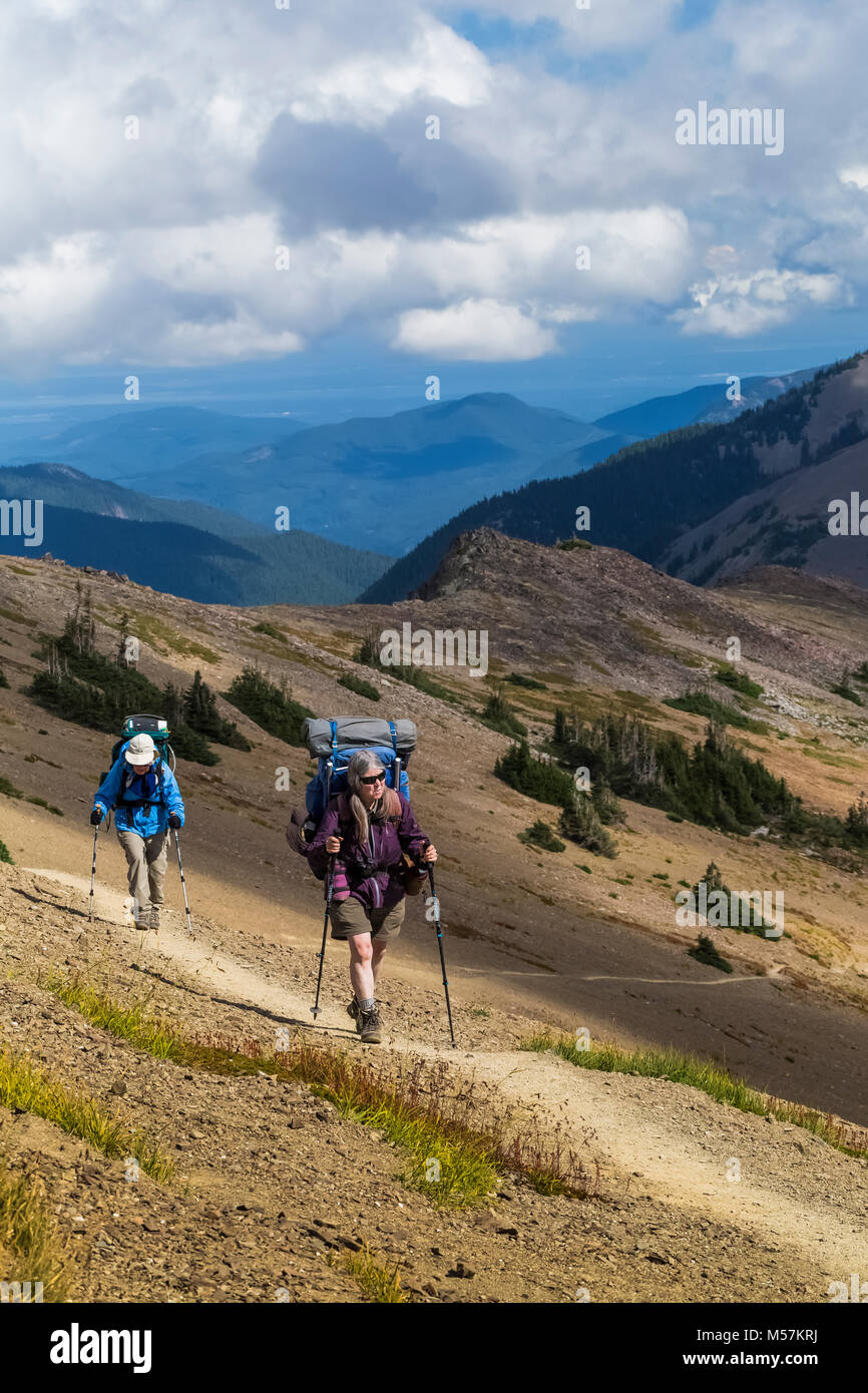 Hikers on Grand Pass Trail near Obstruction Point is exposed and open ...