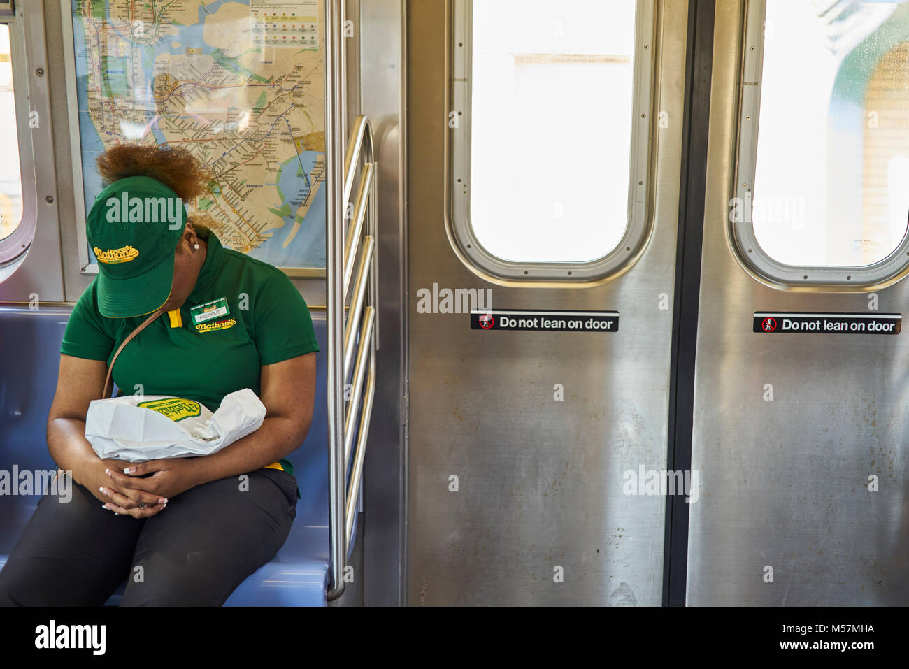 Commuter on the Subway Stock Photo - Alamy