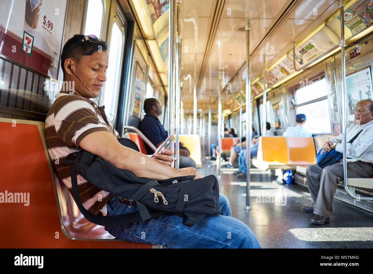 Commuter on the Subway Stock Photo - Alamy
