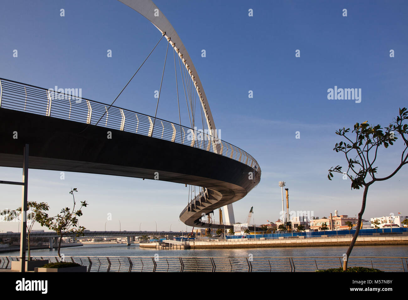 DUBAI, UAE - FEBRUARY, 2018: Dubai Water Canal arch bridge or Tolerance ...